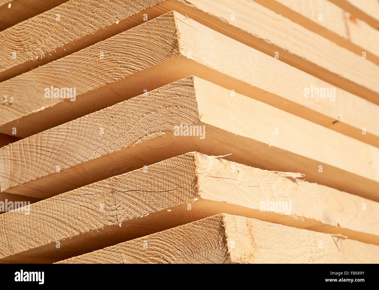 Stack of new wooden studs at the lumber yard Stock Photo - Alamy