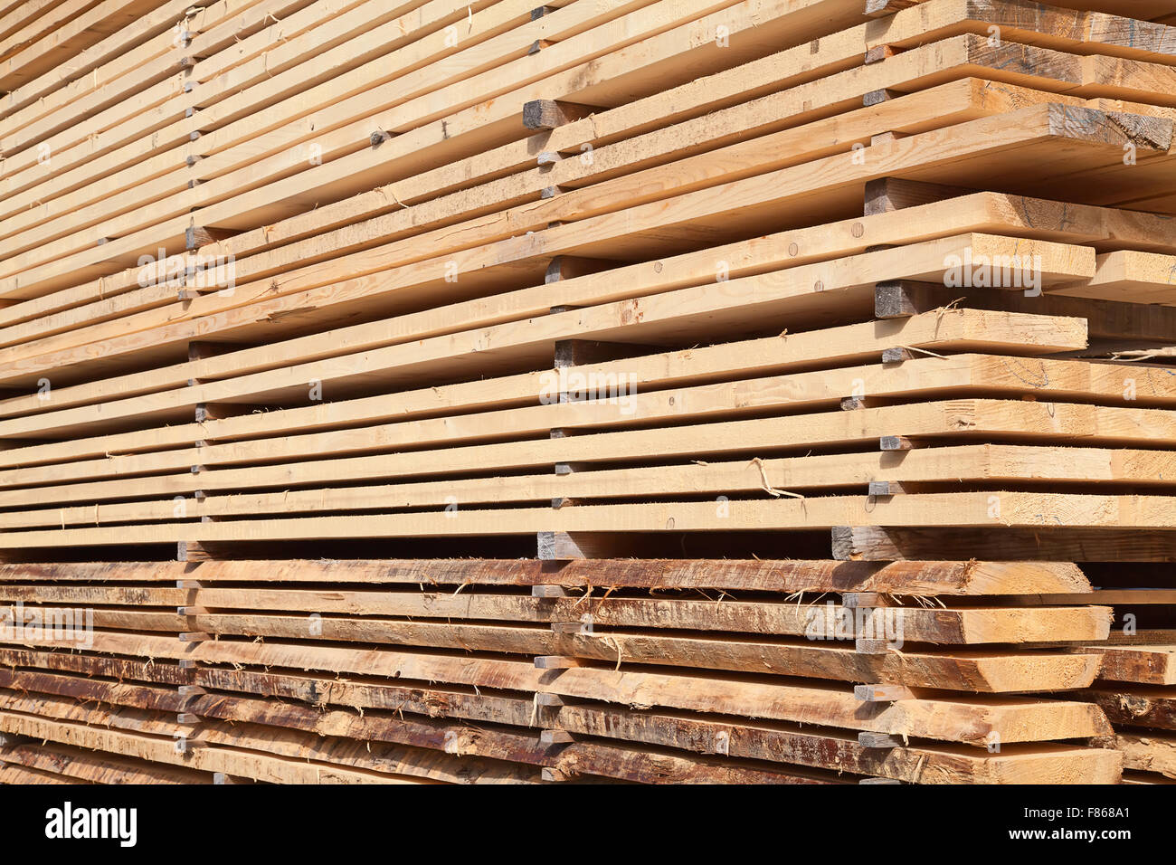 Stack of new wooden studs at the lumber yard Stock Photo - Alamy