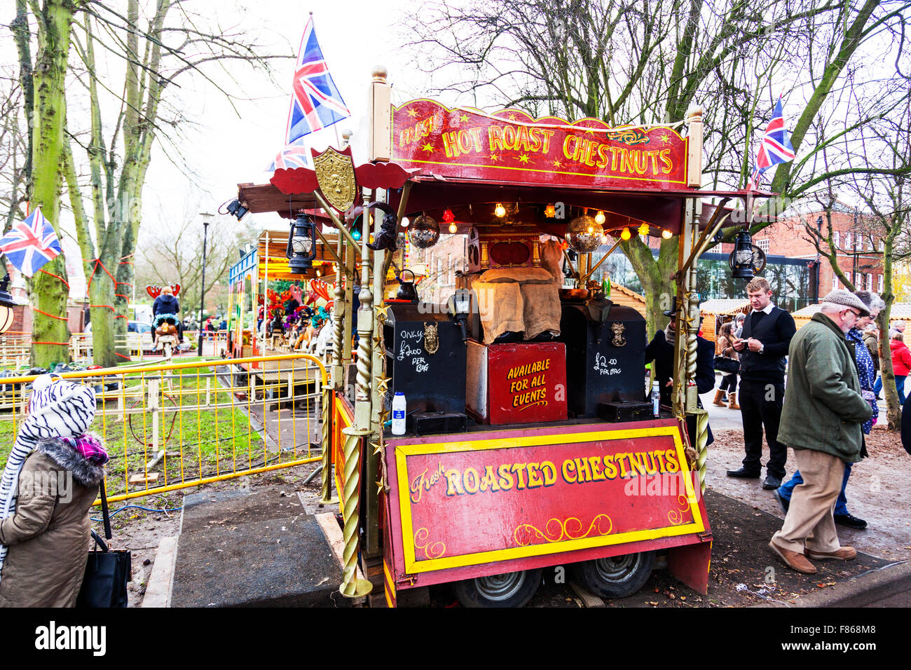 Roasted chestnuts stall selling cooked chestnut treats food seller ...