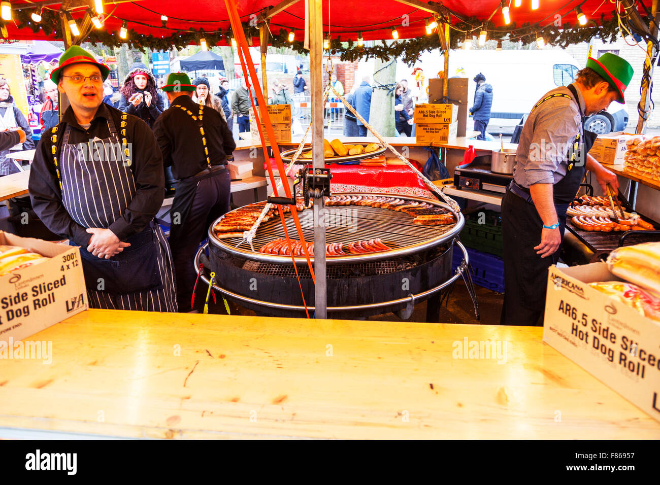 Bratwurst sausages cooking on barbecue pit German Germans selling ...