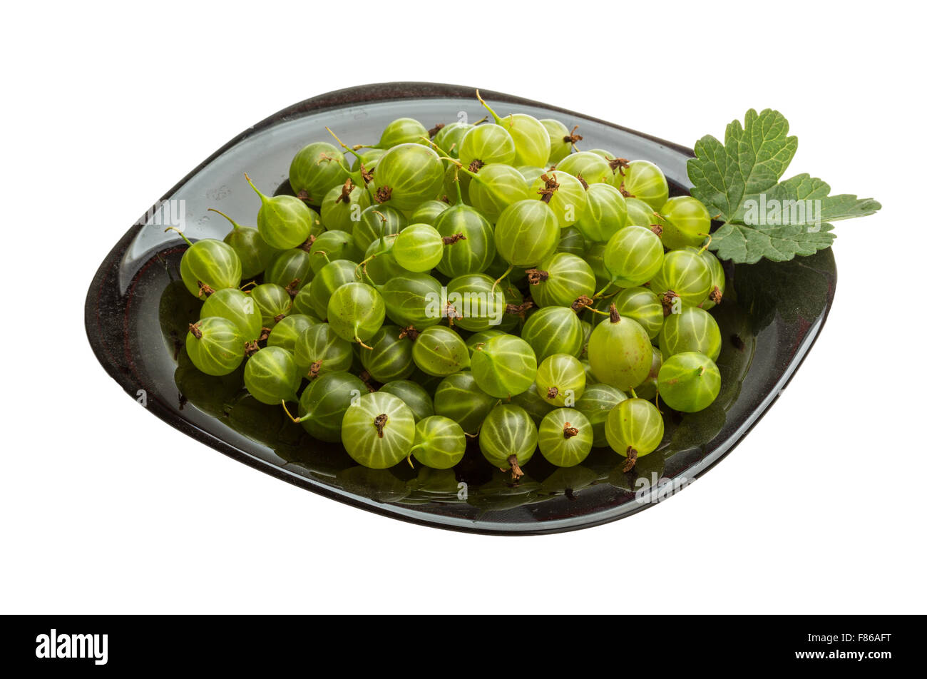 Gooseberry in the bowl isolated on white Stock Photo - Alamy