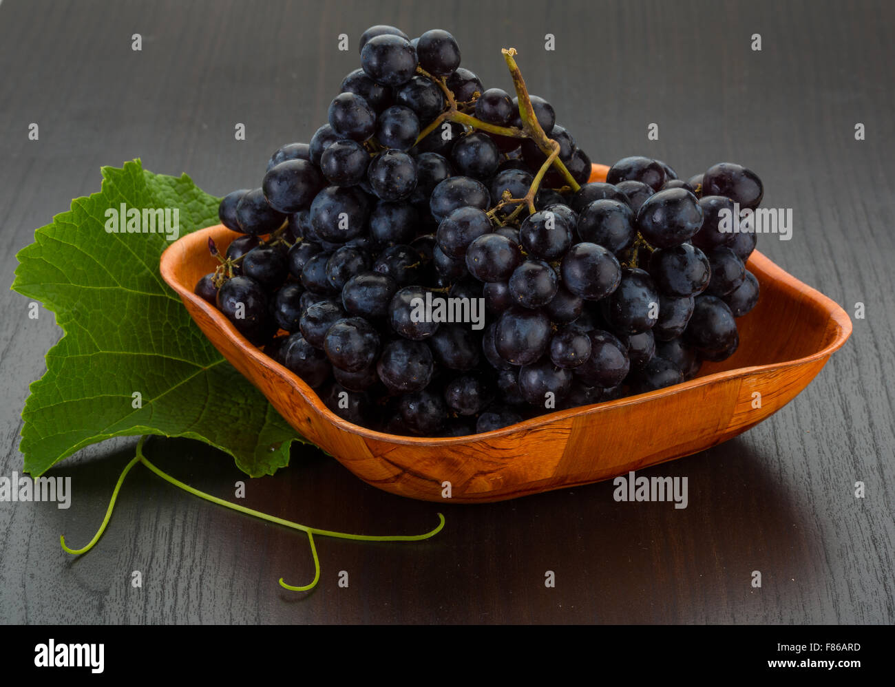 Red grape branch with leaf Stock Photo - Alamy