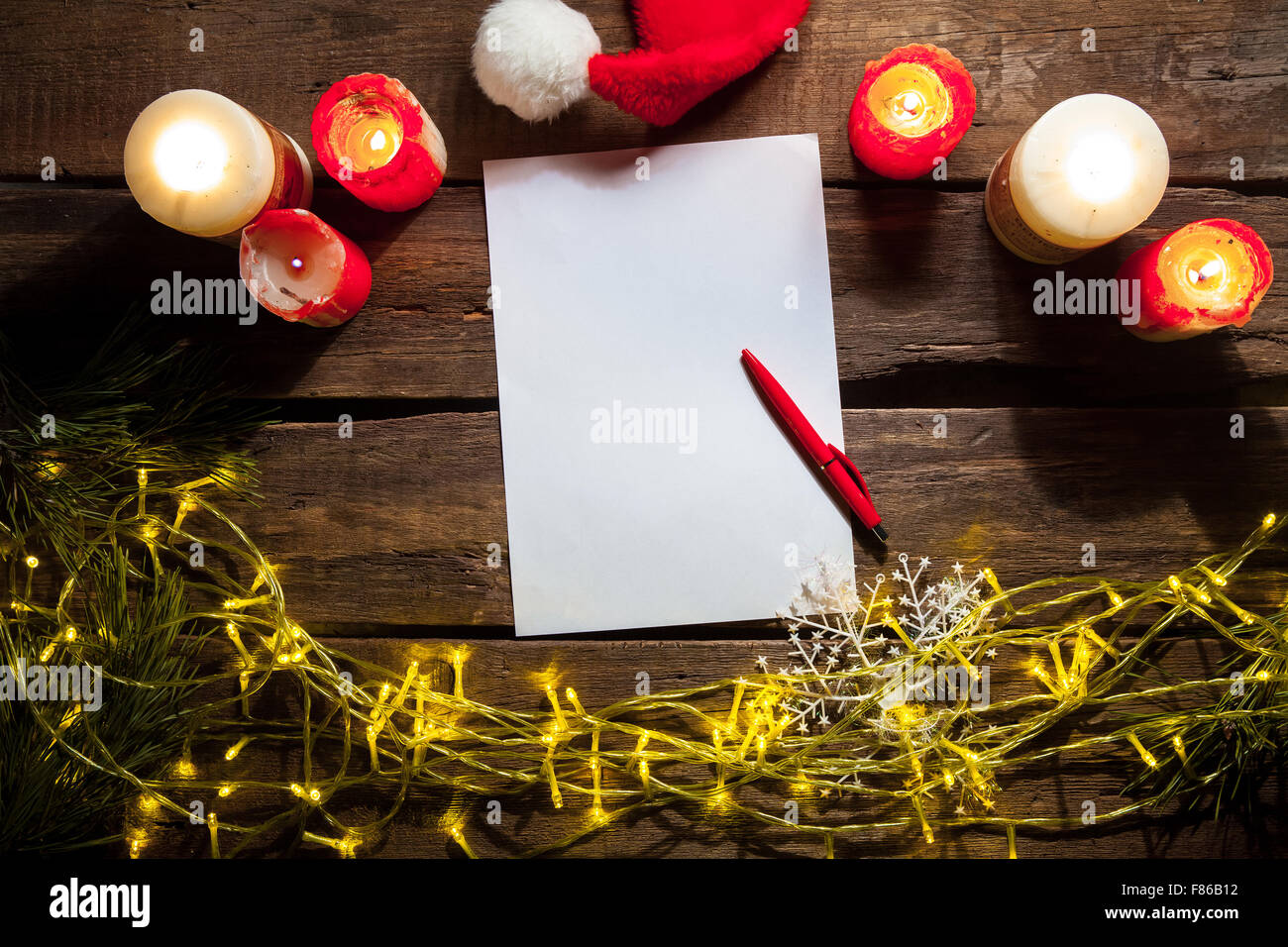 The blank sheet of paper on the wooden table with a pen Stock Photo - Alamy