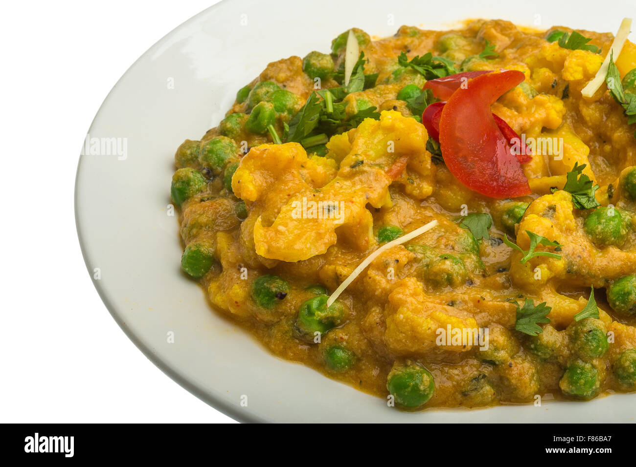 Gobi Mutter Kaju - cauliflower with green peas and cashew Stock Photo ...