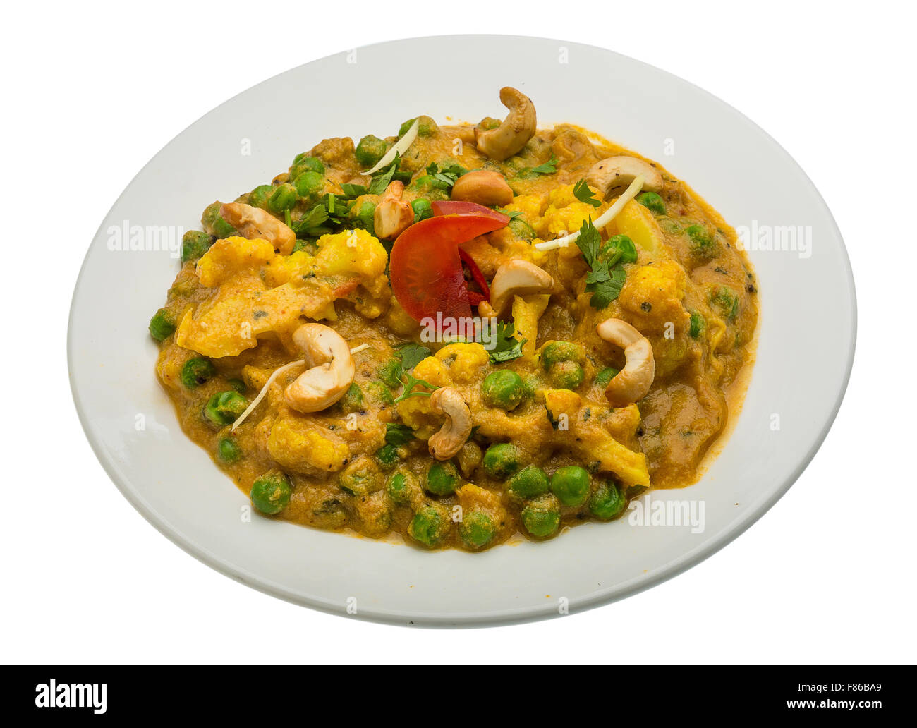 Gobi Mutter Kaju - cauliflower with green peas and cashew Stock Photo ...