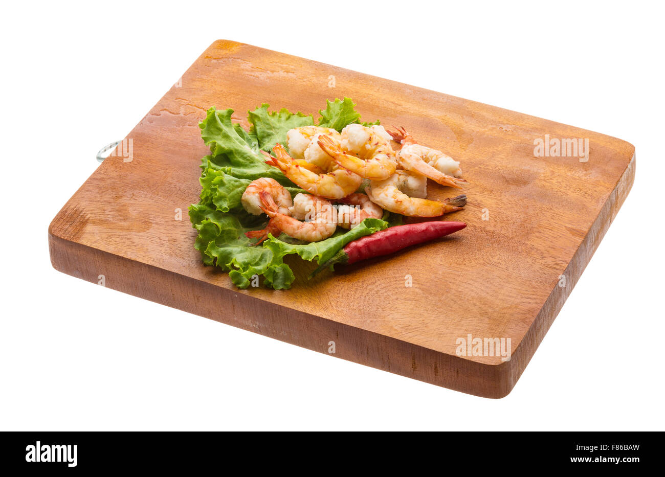 Unshelled king prawn heap with salad leaves Stock Photo - Alamy
