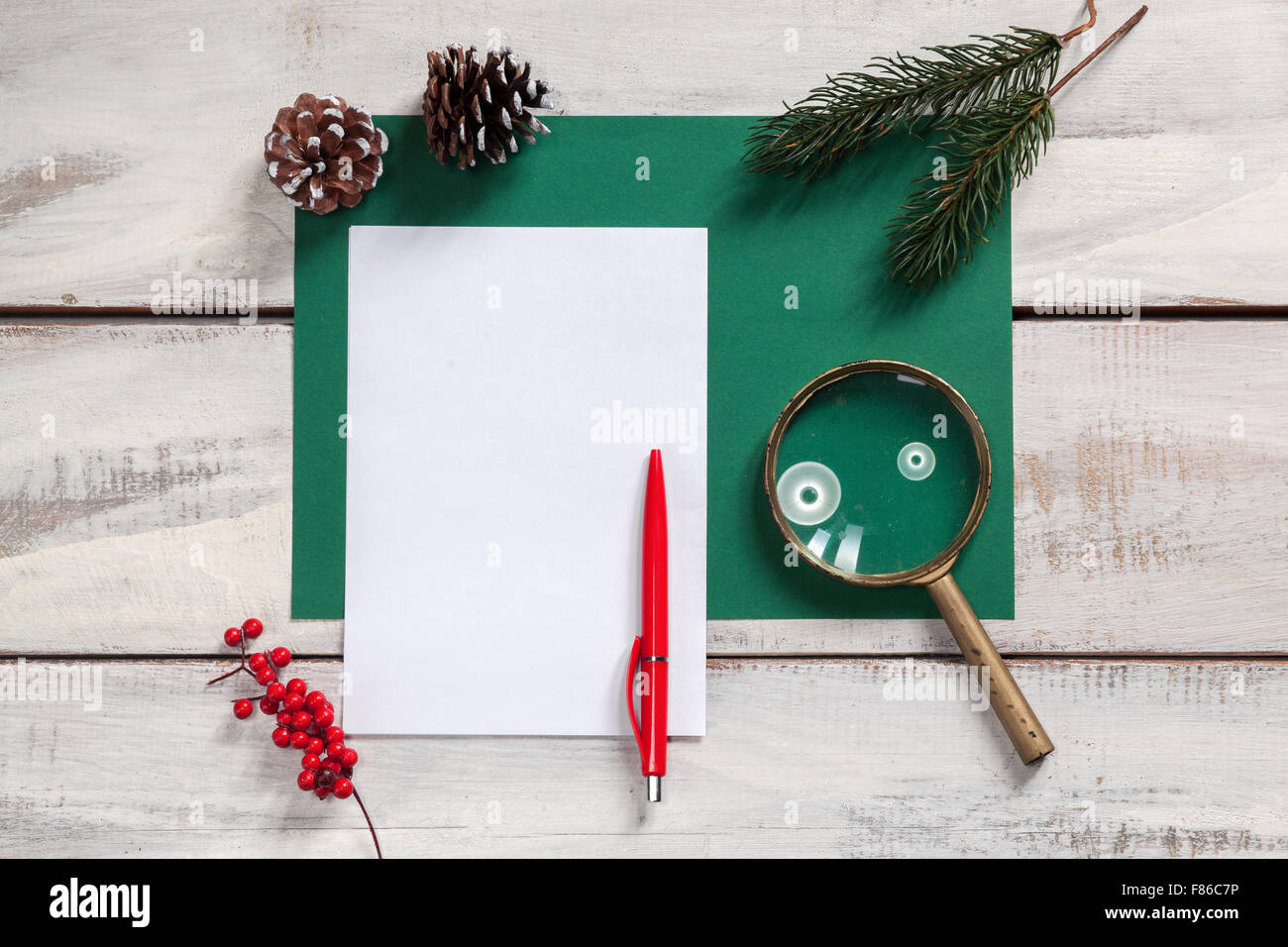 The blank sheet of paper on the wooden table with a pen Stock Photo - Alamy