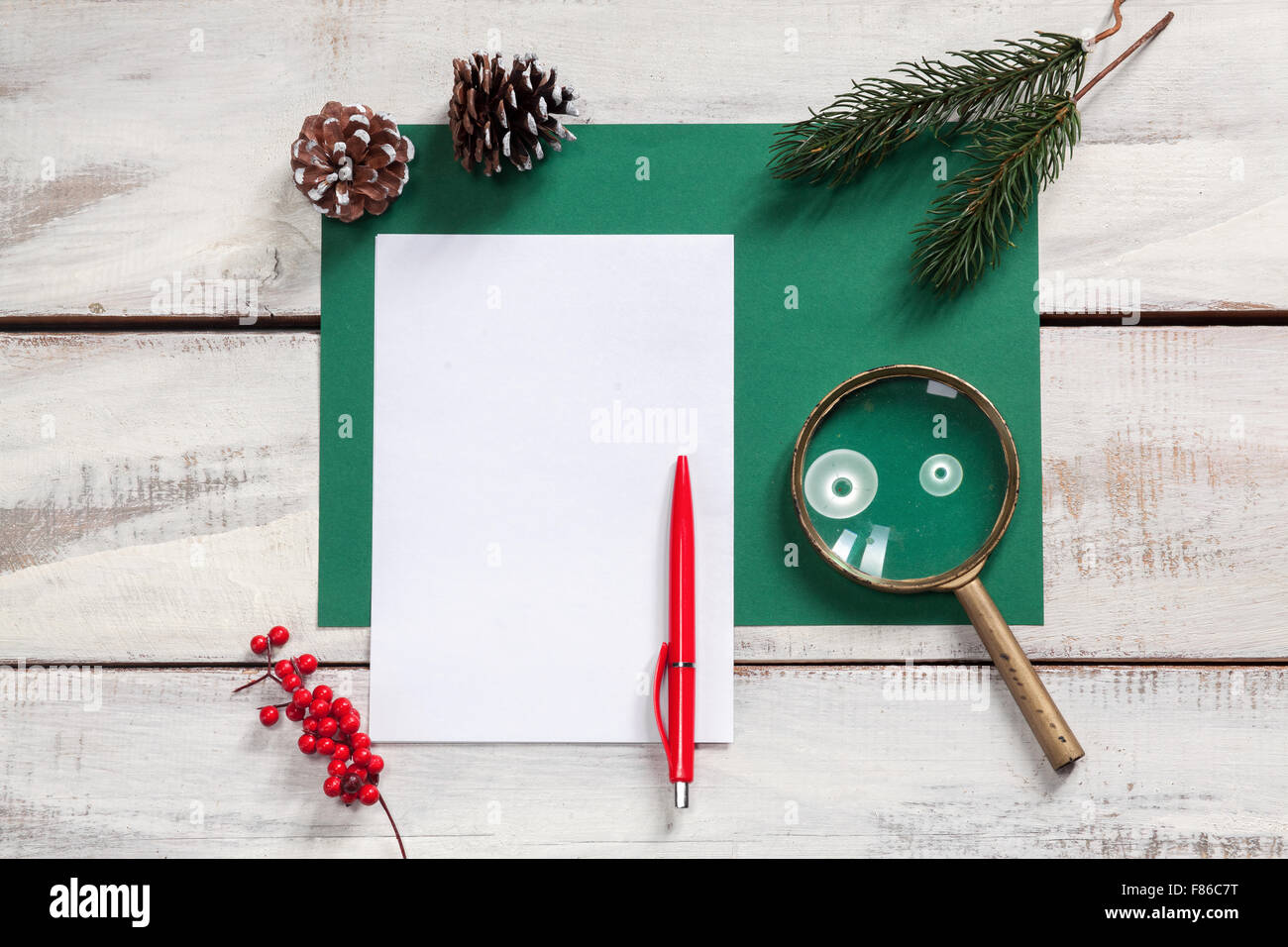 The blank sheet of paper on the wooden table with a pen Stock Photo - Alamy