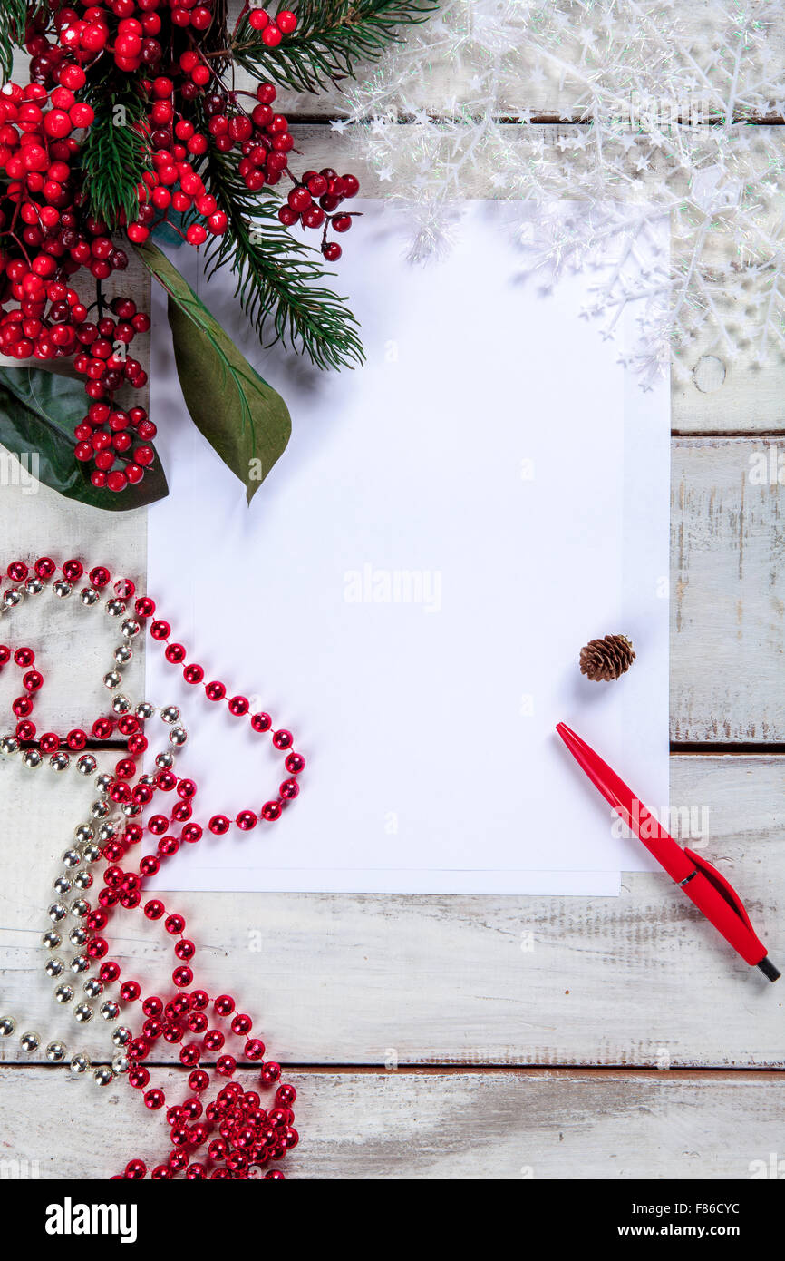 The blank sheet of paper on the wooden table with a pen Stock Photo - Alamy