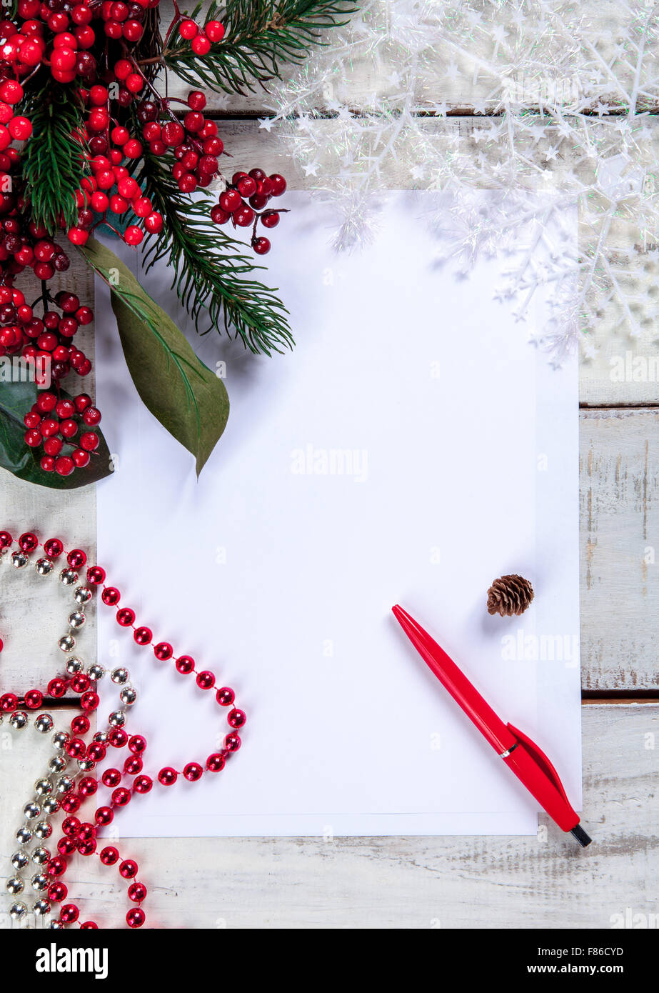 The blank sheet of paper on the wooden table with a pen Stock Photo - Alamy