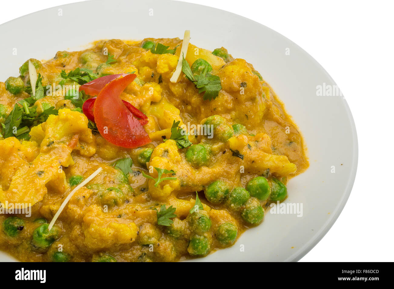 Gobi Mutter Kaju - cauliflower with green peas and cashew Stock Photo ...