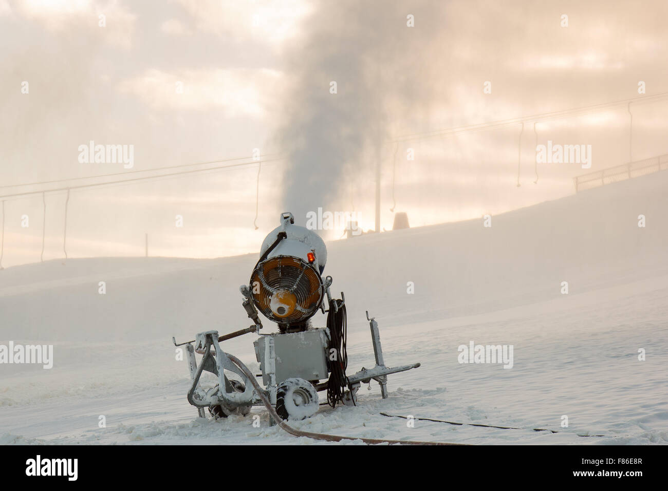 Snow blowing cannon Stock Photo - Alamy