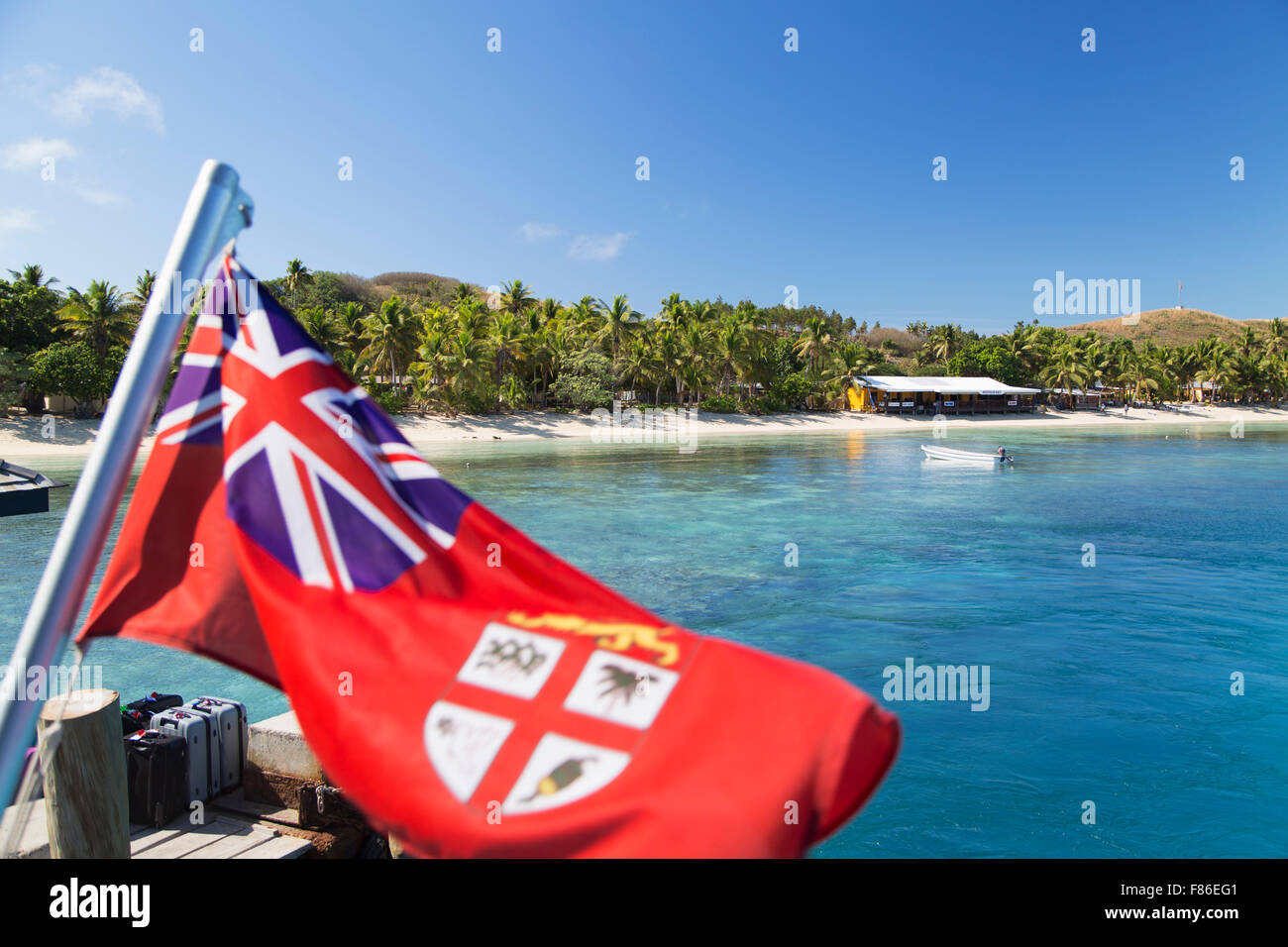 Ratu Kini Resort and Fijian flag, Mana Island, Mamanuca Islands, Fiji ...