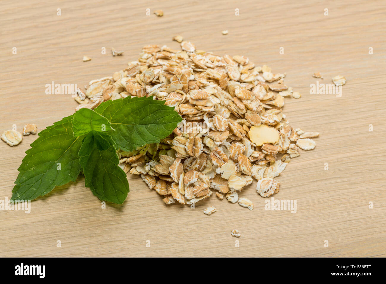 Raw oats on the board Stock Photo - Alamy
