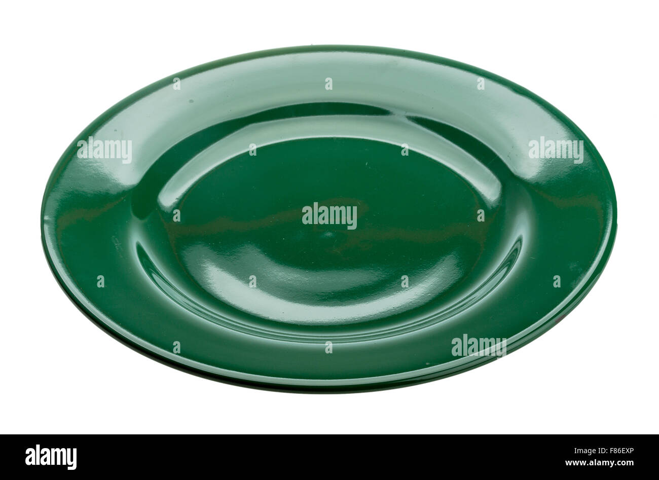 Green plate isolated on white background Stock Photo - Alamy