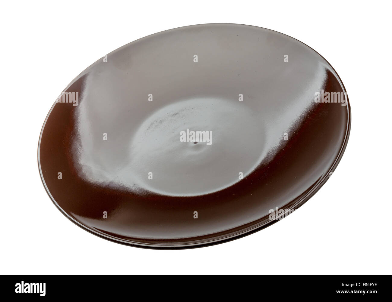 Brown plate isolated on white background Stock Photo - Alamy