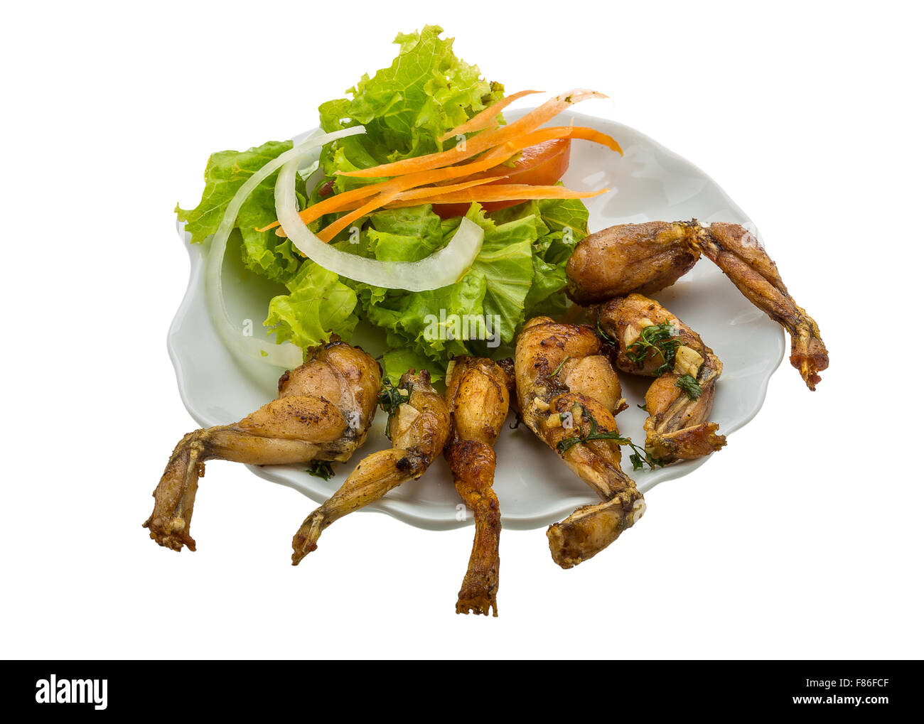Grilled frog legs - French style Stock Photo - Alamy