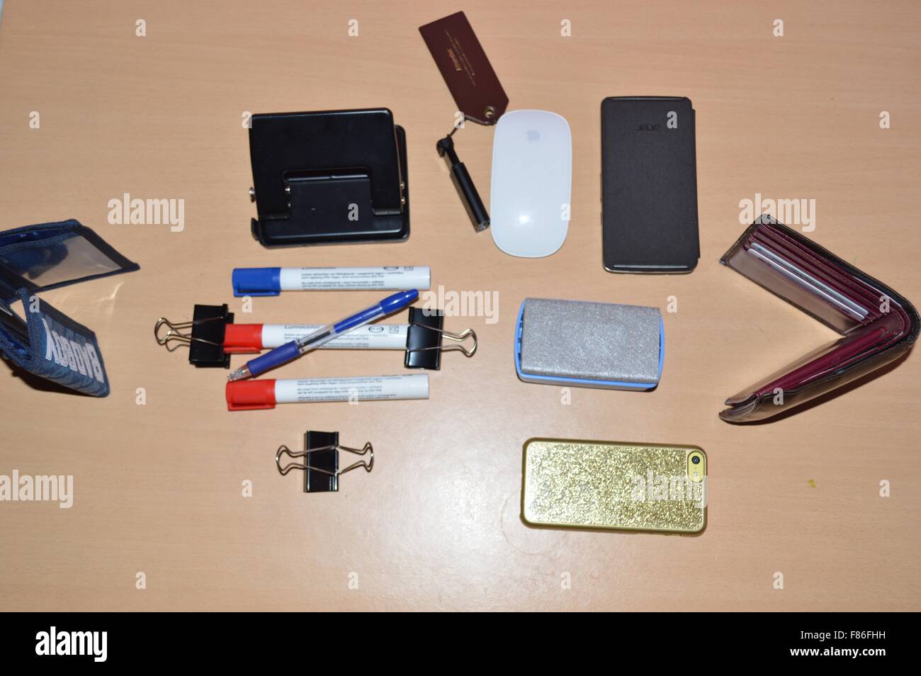 A messy study table of student with electronic devices and study stuffs ...