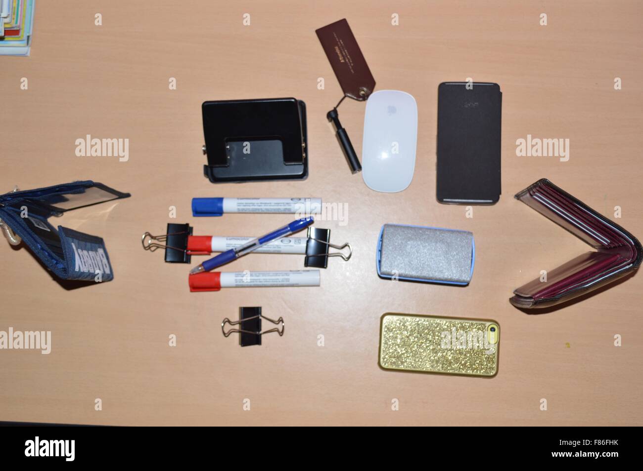 A messy study table of student with electronic devices and study stuffs ...