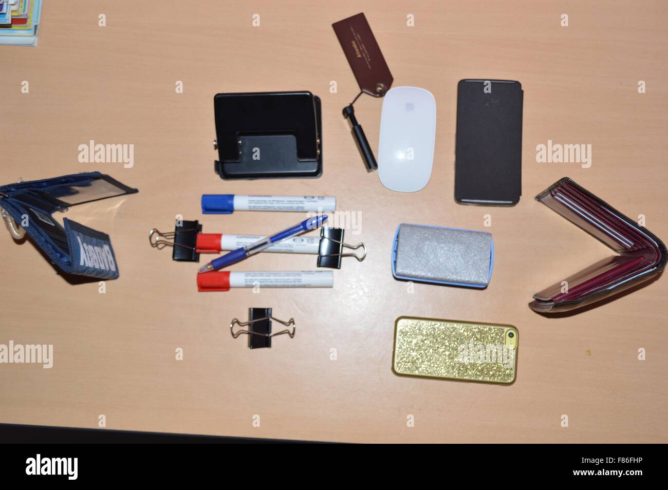 A messy study table of student with electronic devices and study stuffs ...