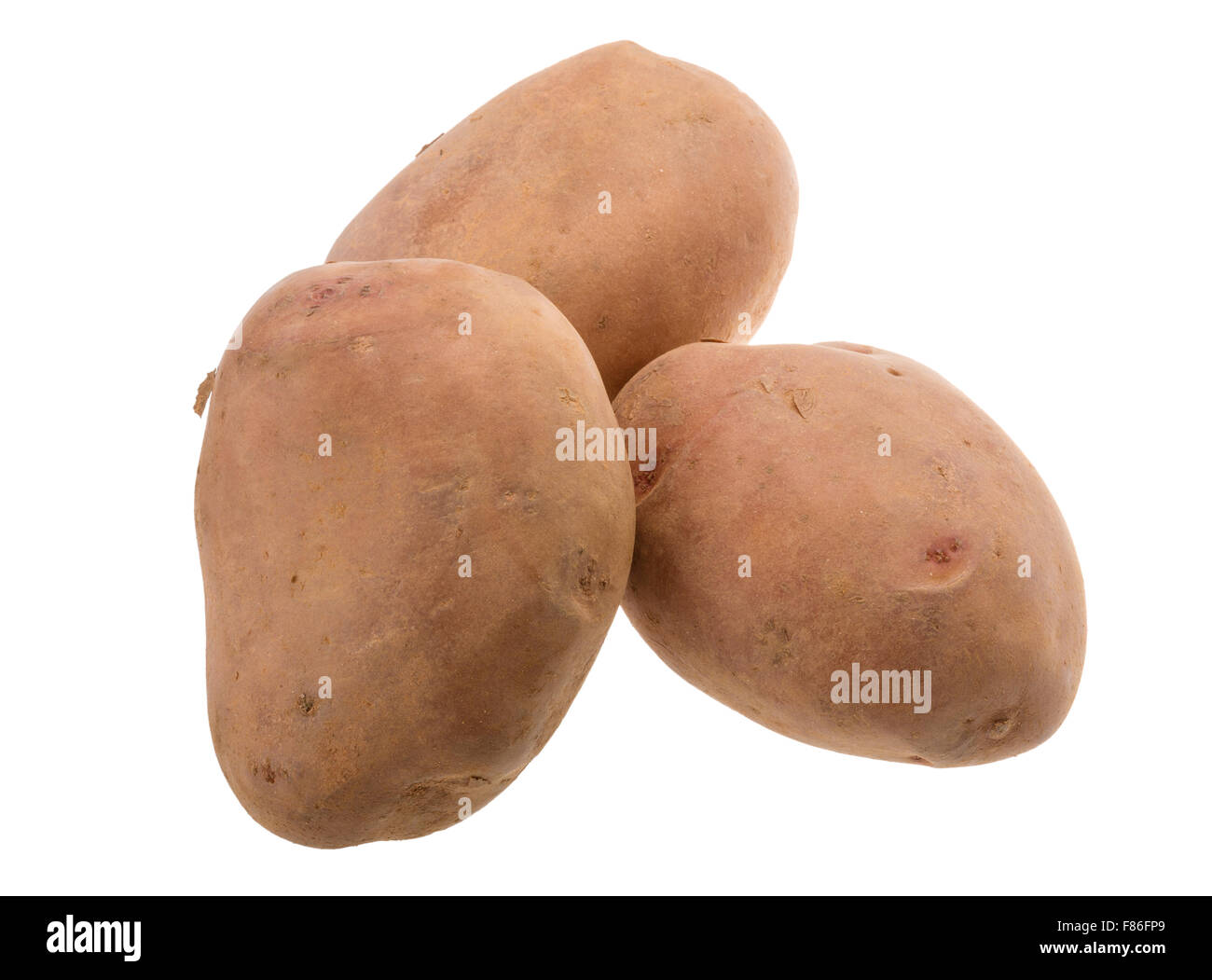 Heap of raw potato isolated Stock Photo - Alamy