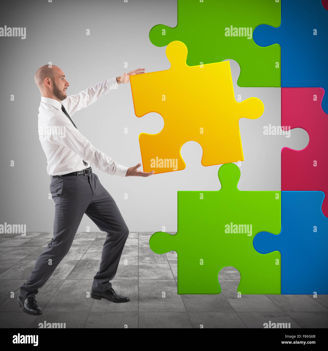 Complete a puzzle Stock Photo - Alamy