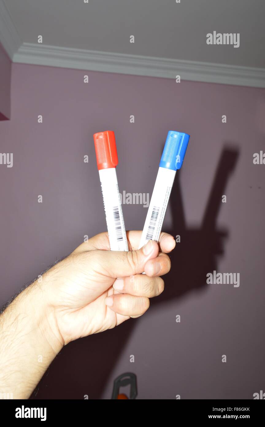 Multicolor pen set and white-board marker pen in human hand Stock Photo ...