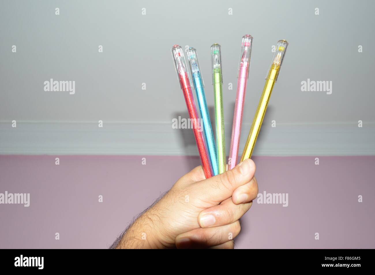 Multicolor pen set and white-board marker pen in human hand Stock Photo ...