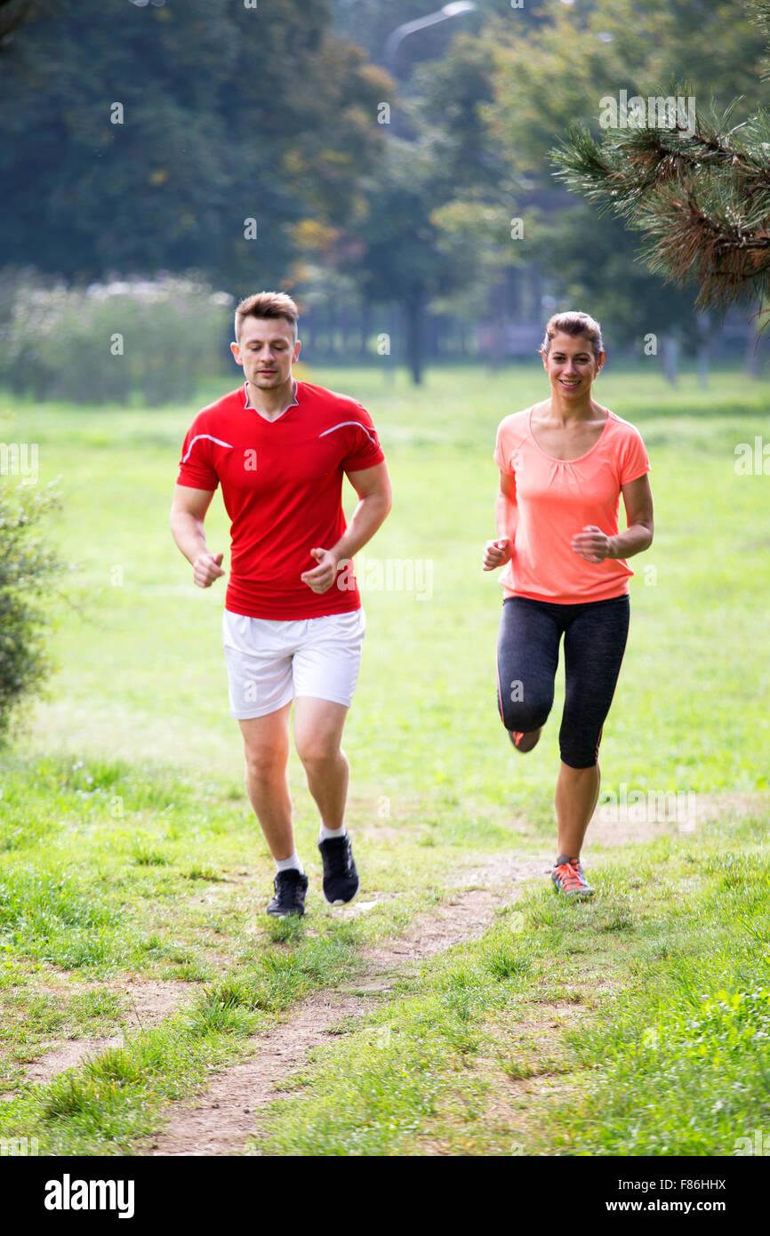Young sporty female running in hi-res stock photography and images - Alamy