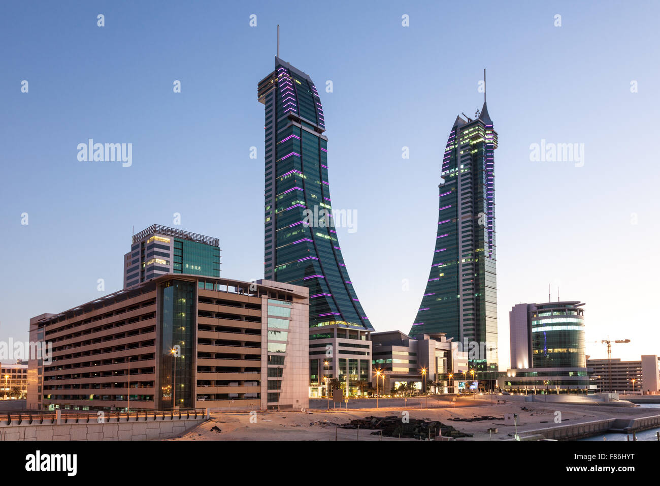 Bahrain Financial Harbour Skyscrapers in Manama illuminated at dusk ...