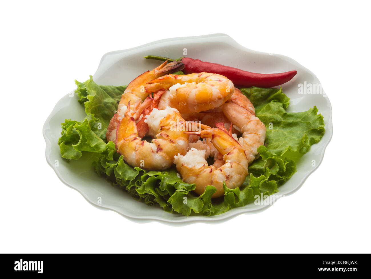 Unshelled king prawn heap with salad leaves Stock Photo - Alamy