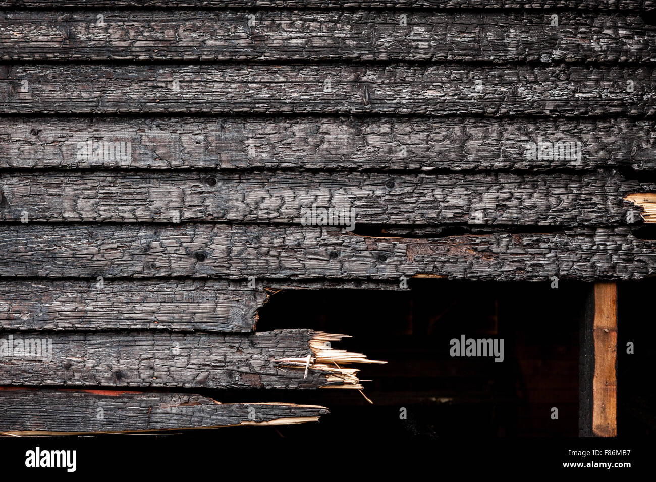 Burnt broken wood wall Stock Photo - Alamy