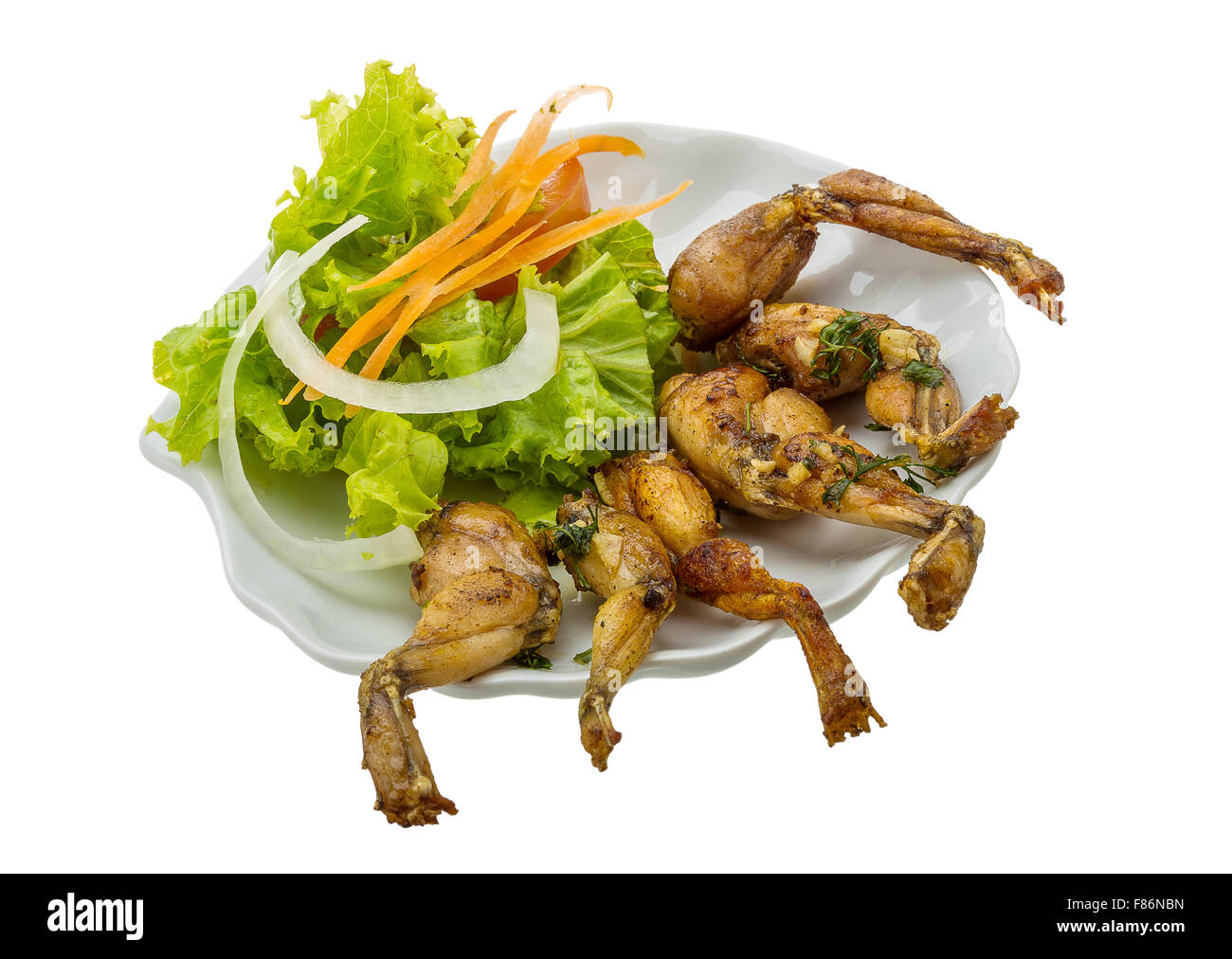 Grilled frog legs - French style Stock Photo - Alamy