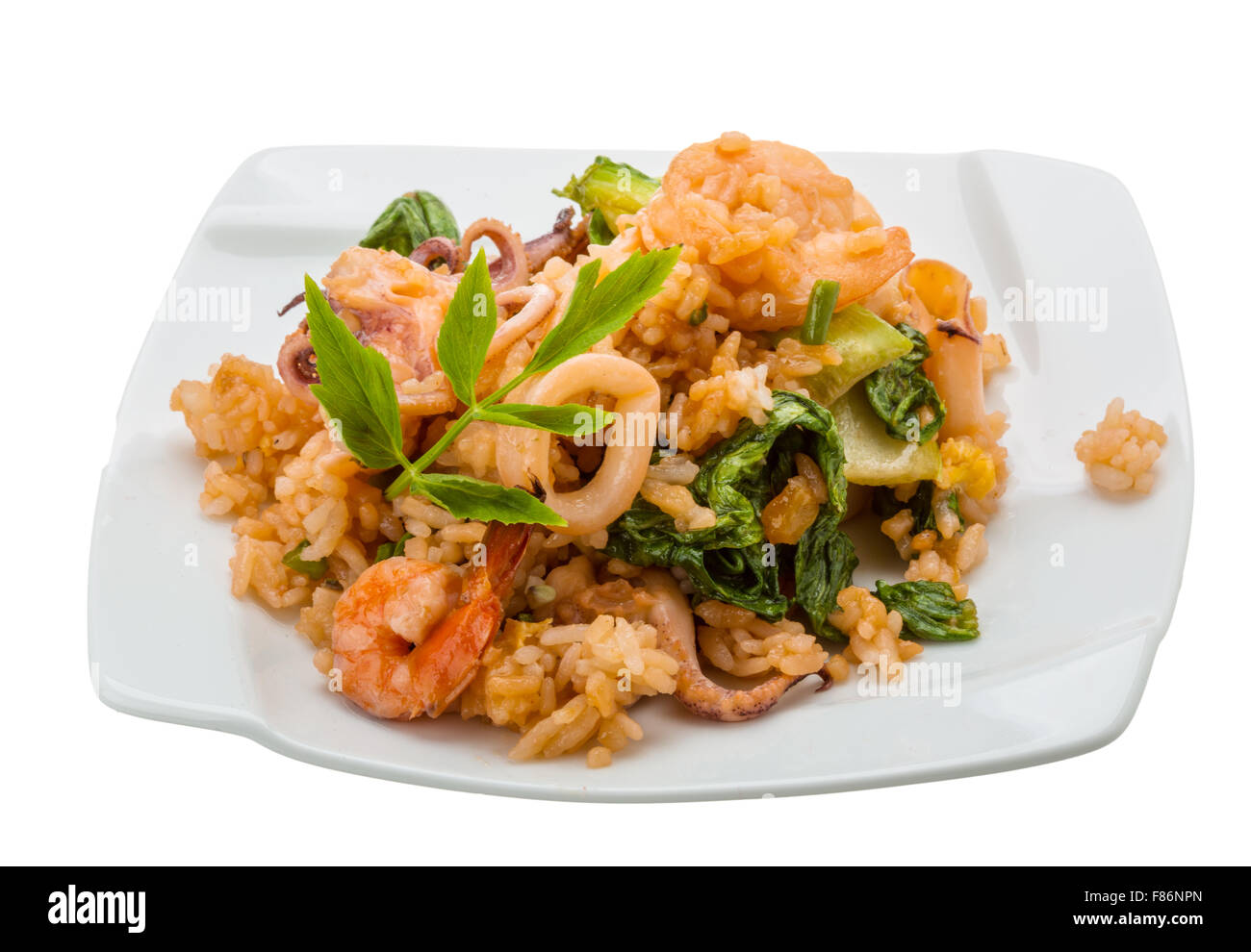 Rice with seafood isolated on white Stock Photo - Alamy