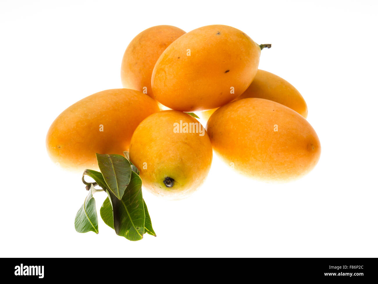 Bouea macrophylla heap isolated on white Stock Photo - Alamy