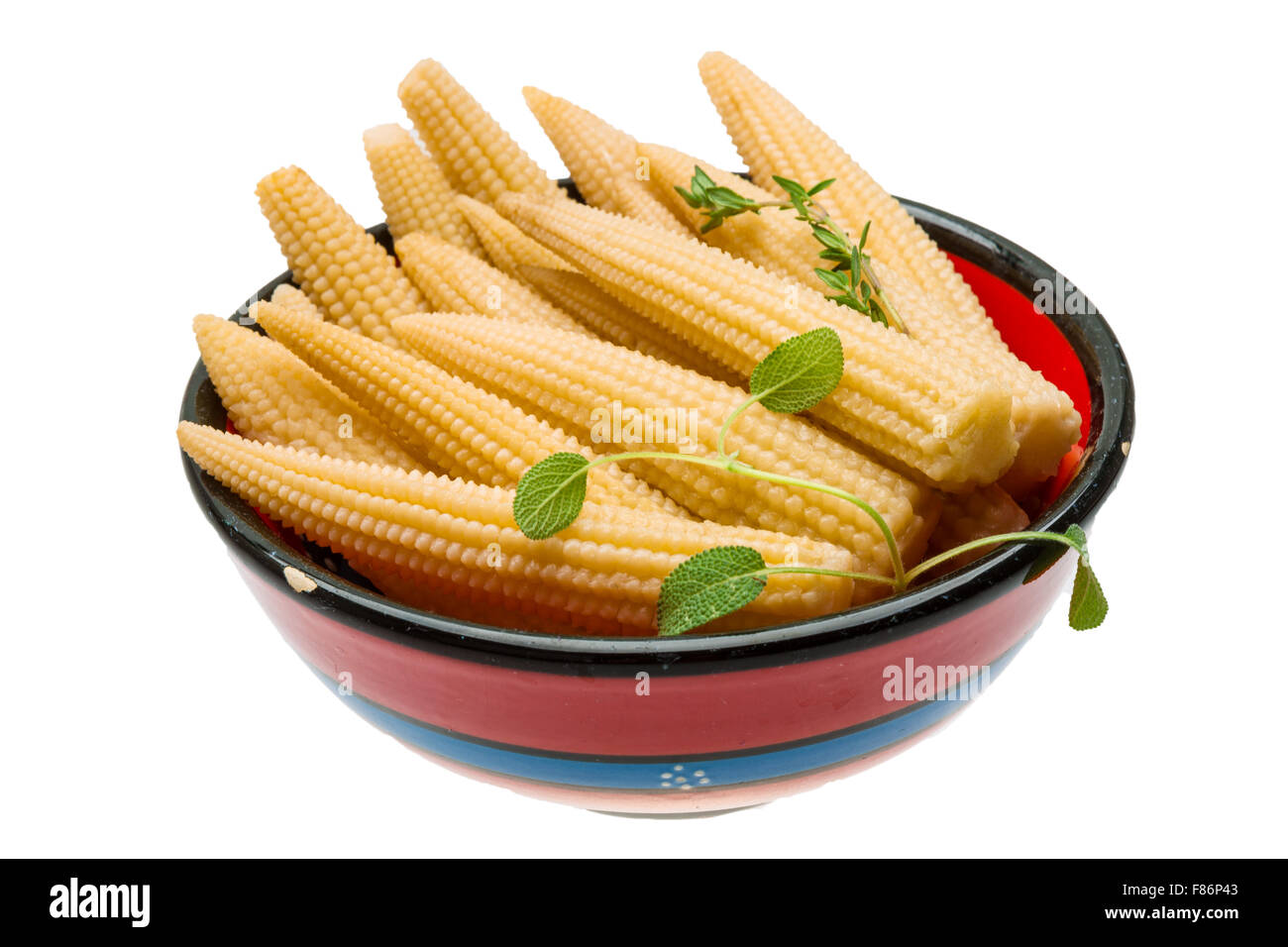 Baby corn with thyme Stock Photo - Alamy