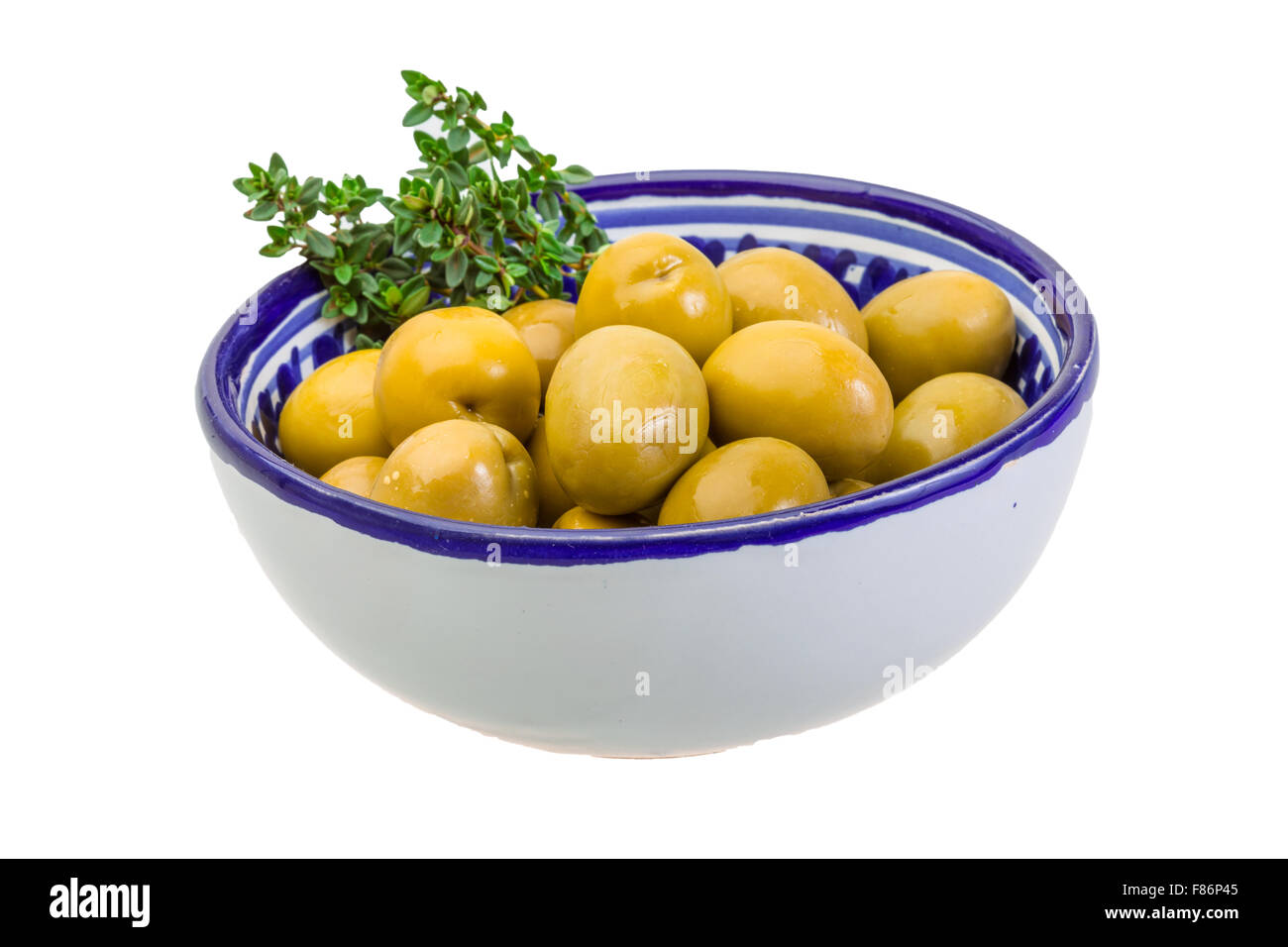 Green gigant olives with thyme Stock Photo - Alamy