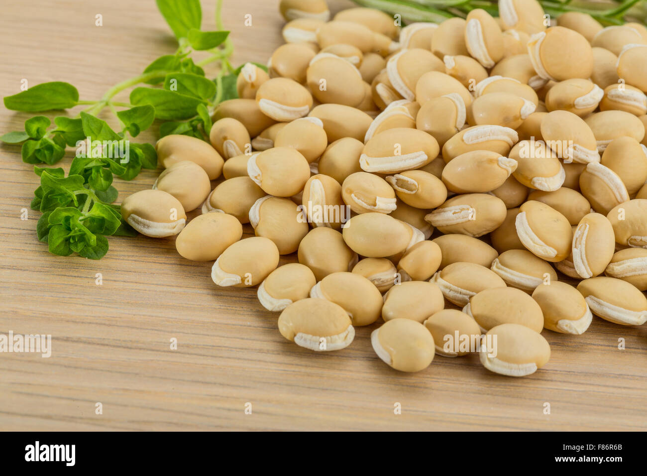 Raw soya beans on the desk Stock Photo - Alamy