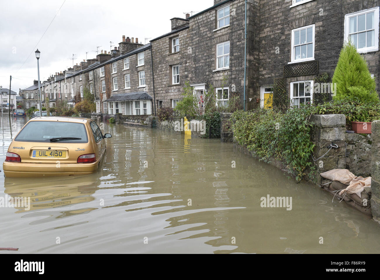 Kendal, UK. 06th Dec, 2015. Cars flooded in Castle Crescent, Kendal ...