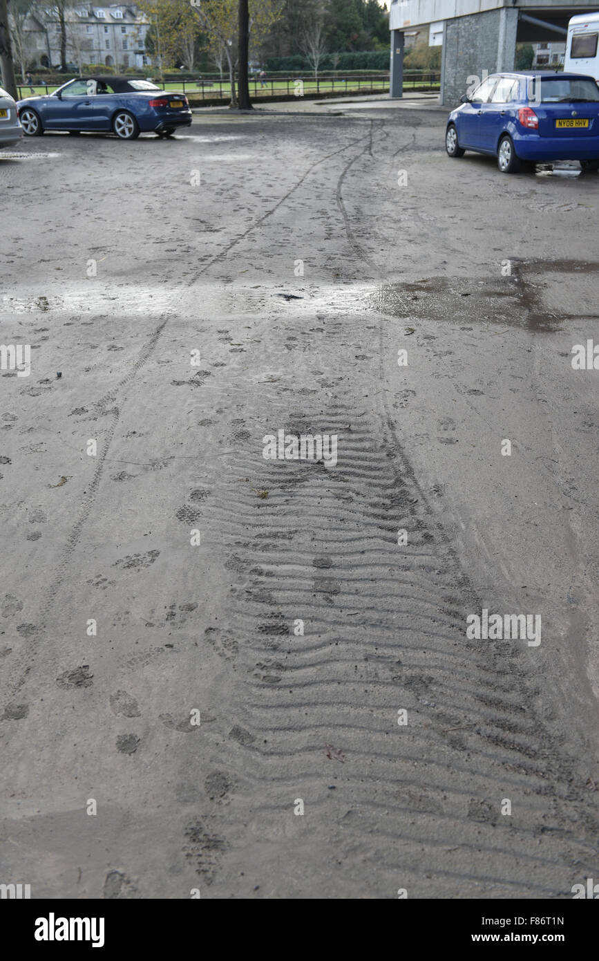 Kendal, UK. 06th Dec, 2015. Silt is seen on a car park in Kendal after ...