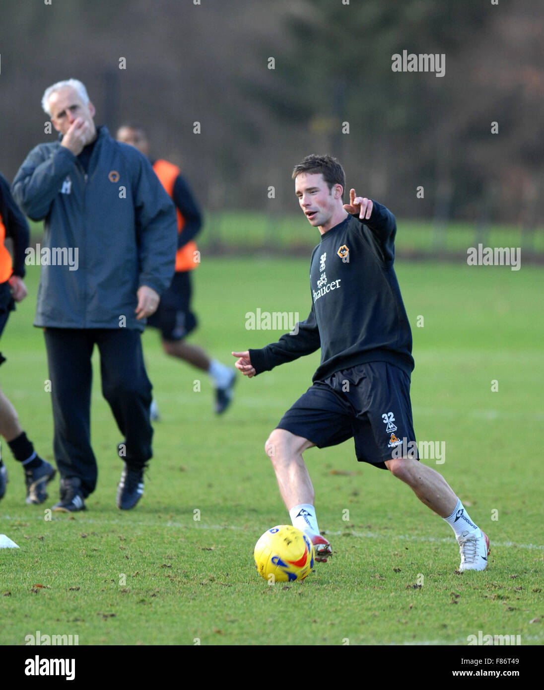 Michael McIndoe in training watched by Mick McCarthy Stock Photo - Alamy