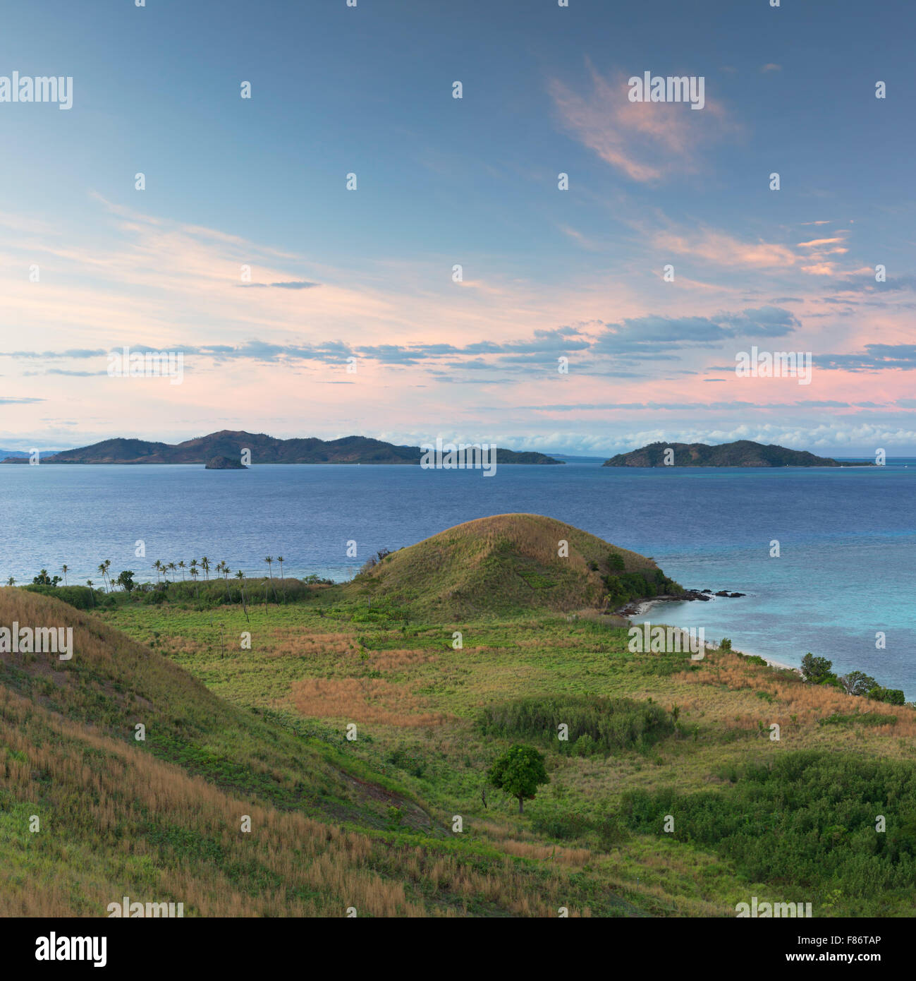 Mana Island at sunrise, Mamanuca Islands, Fiji Stock Photo - Alamy