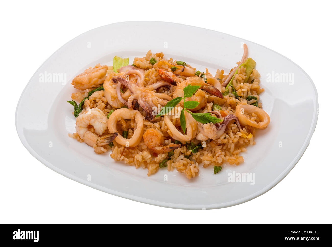 Rice with seafood isolated on white Stock Photo - Alamy