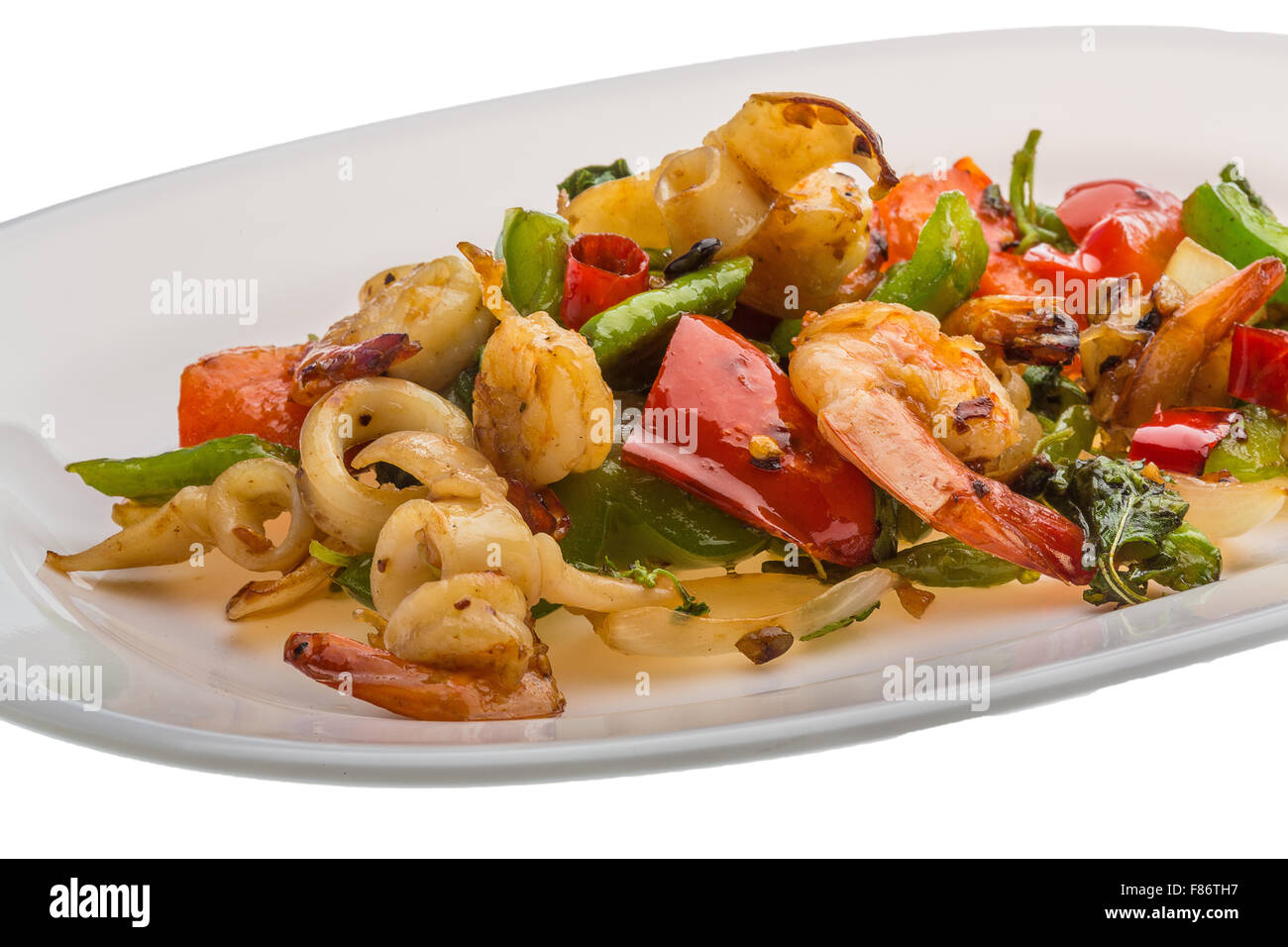 Seafood with vegetables - shrimps and calamari Stock Photo - Alamy