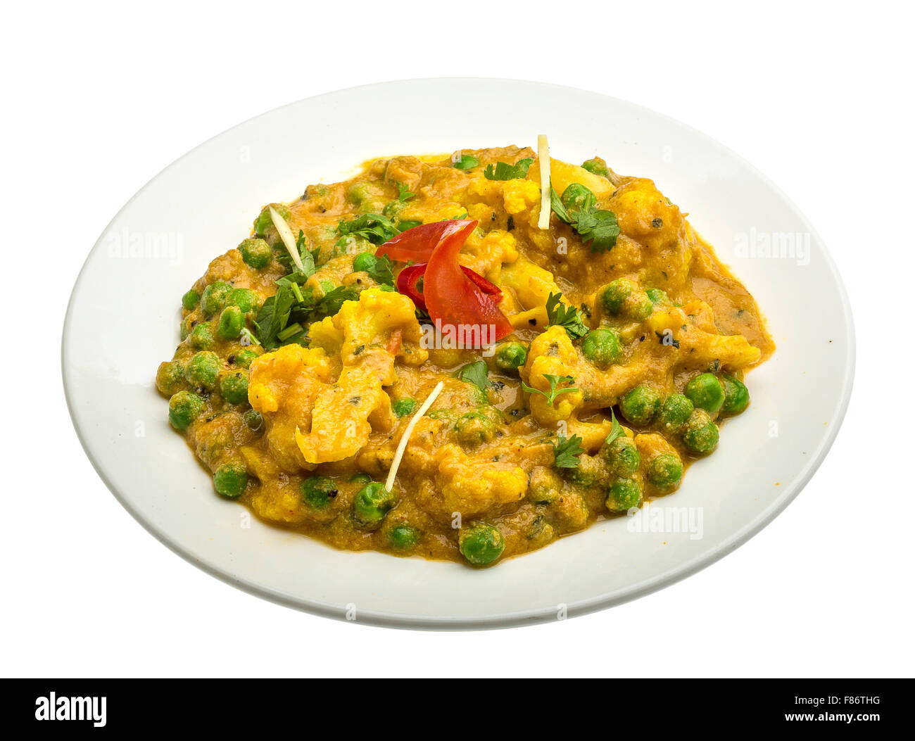 Gobi Mutter Kaju - cauliflower with green peas and cashew Stock Photo ...