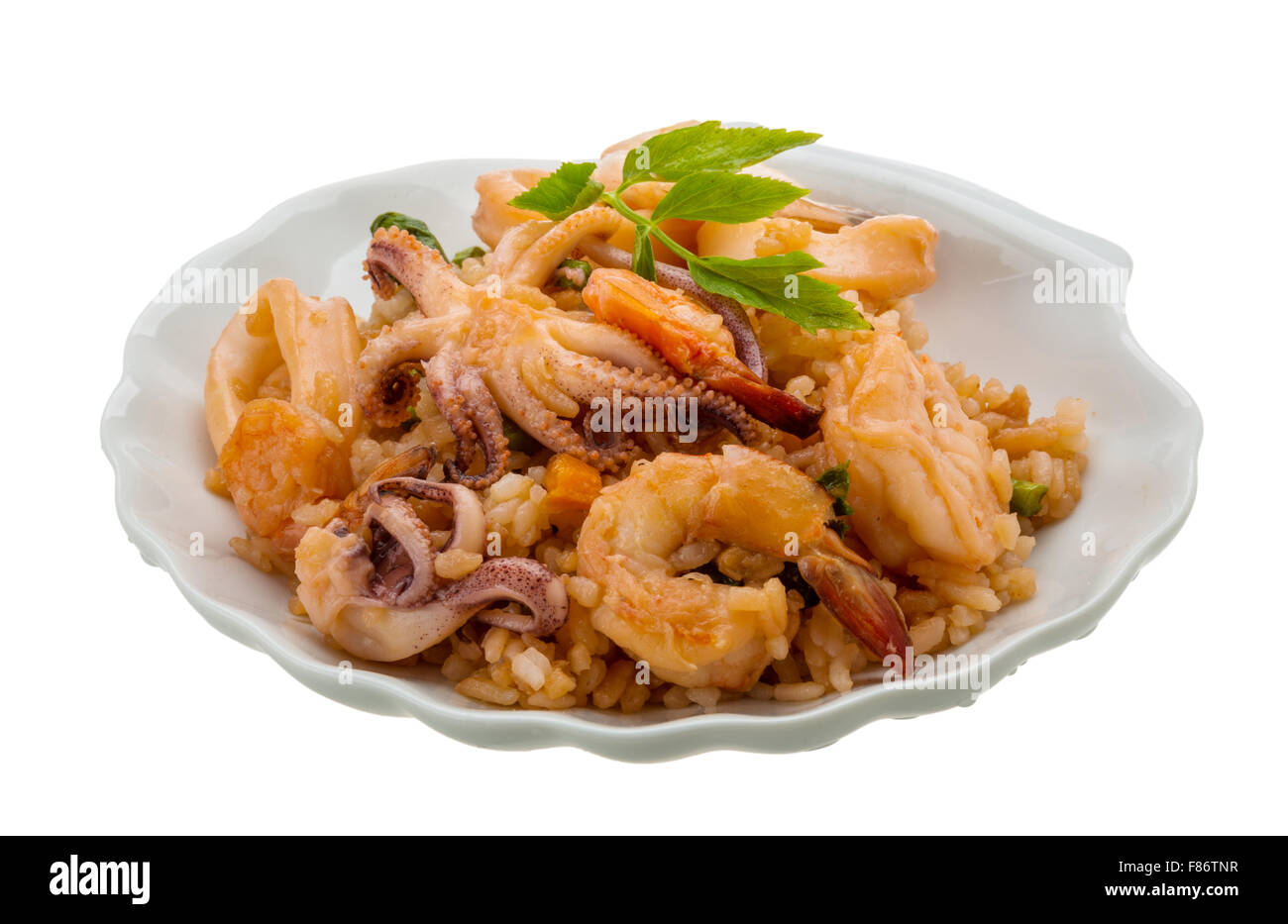 Rice with seafood isolated on white Stock Photo - Alamy