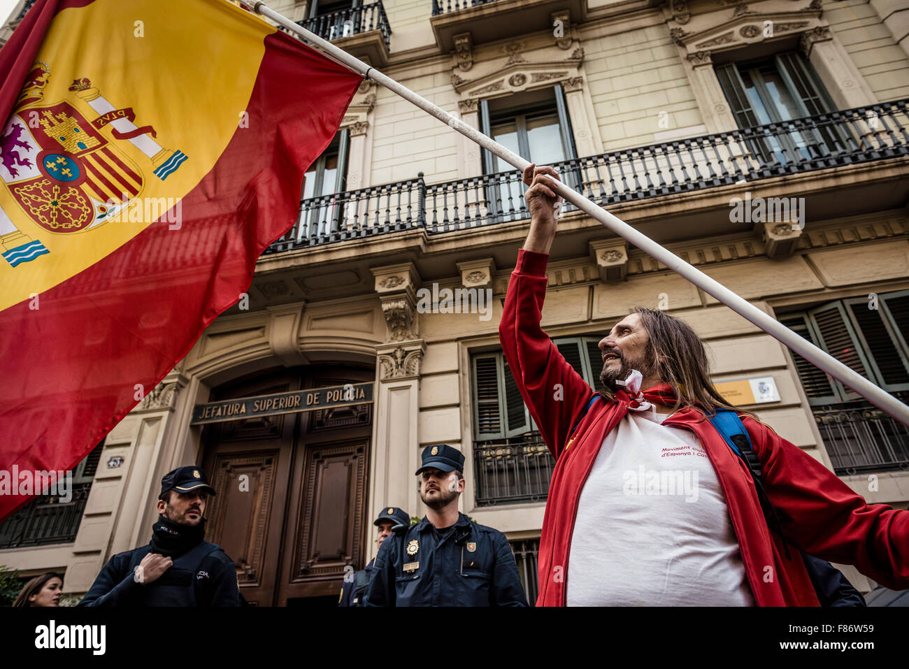 Barcelona, Spain. 06th Dec, 2015. A demonstrator poses with his Spanish ...