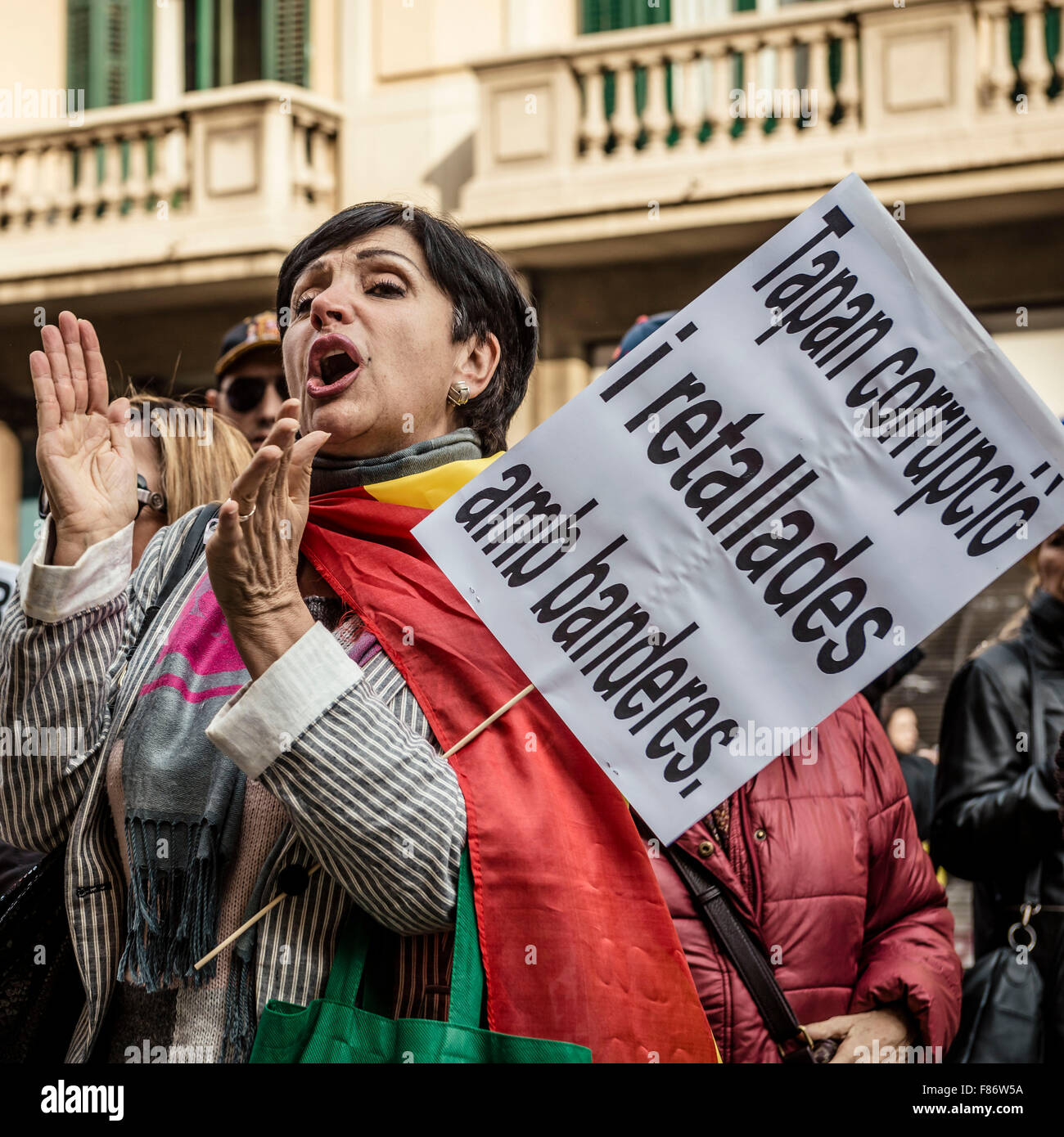 Barcelona, Spain. 06th Dec, 2015. A demonstrator shouts slogans as she ...
