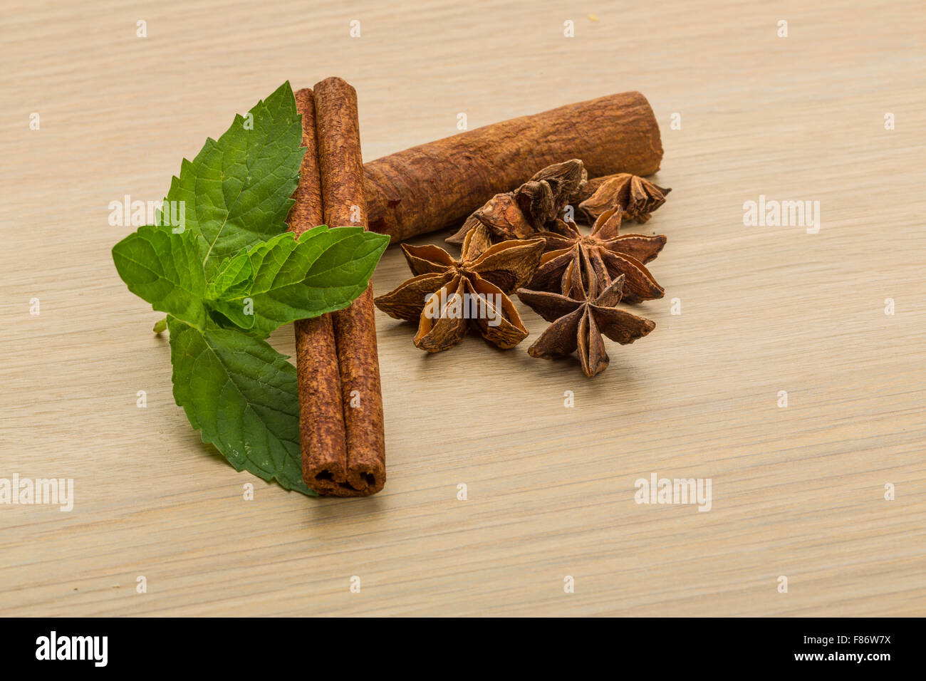 Cinnamon sticks, star anise and mint Stock Photo - Alamy