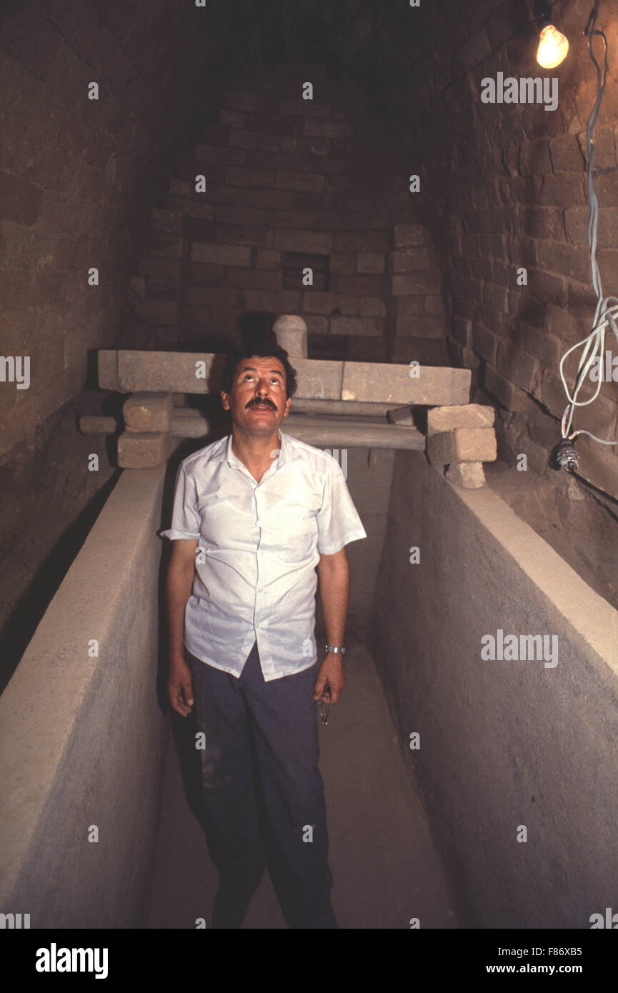 Iraqi archaeologist Mahmoud standing in the chamber where he made Iraq ...